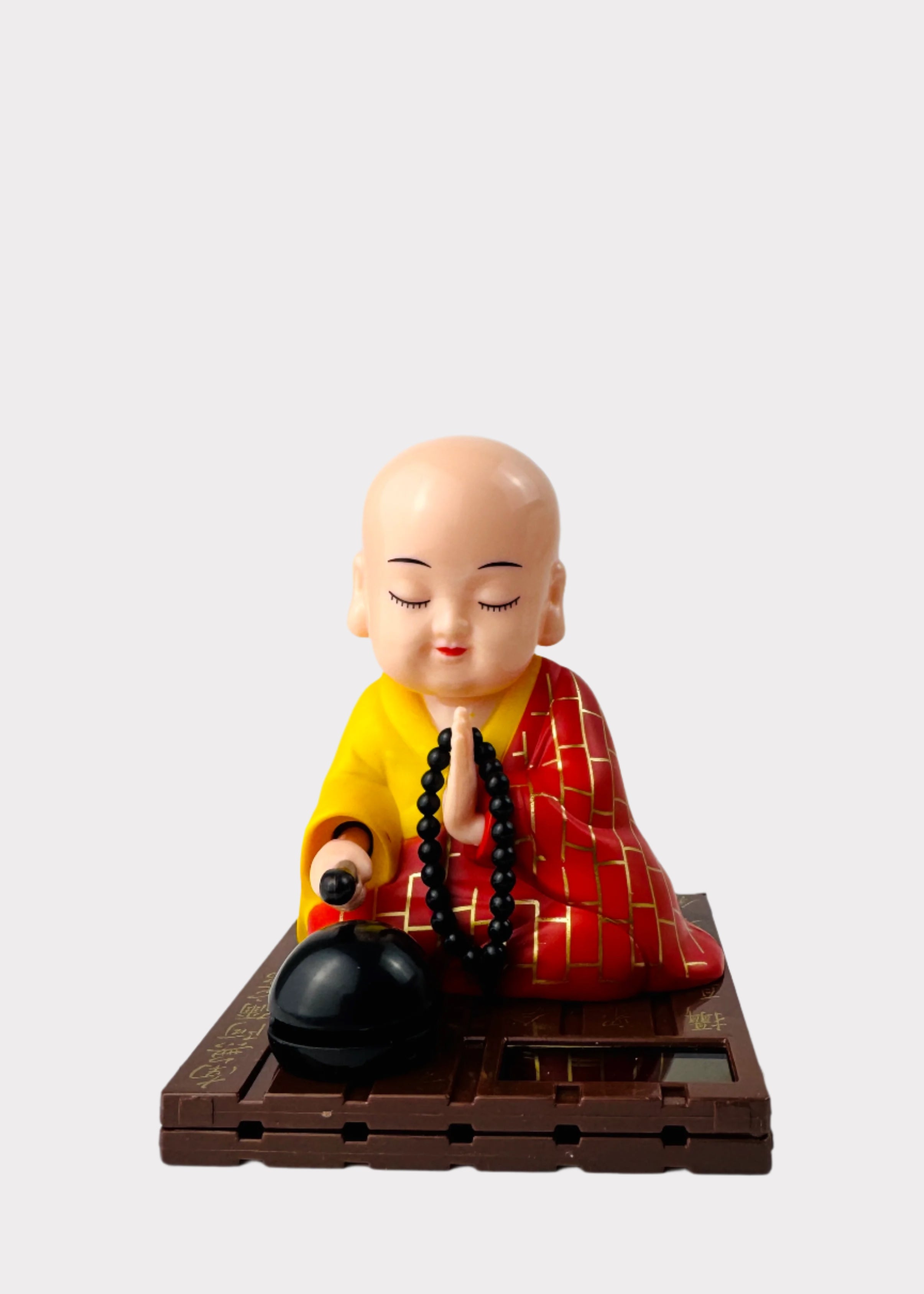 Solar Powered Nodding Prayer Monk Figurine – Rainbow